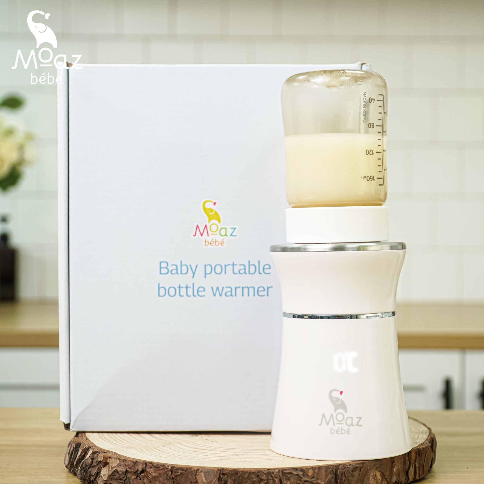 Máy hâm sữa di động cầm tay Moaz bébé MB041 - NGUYÊN TRÍ BABY